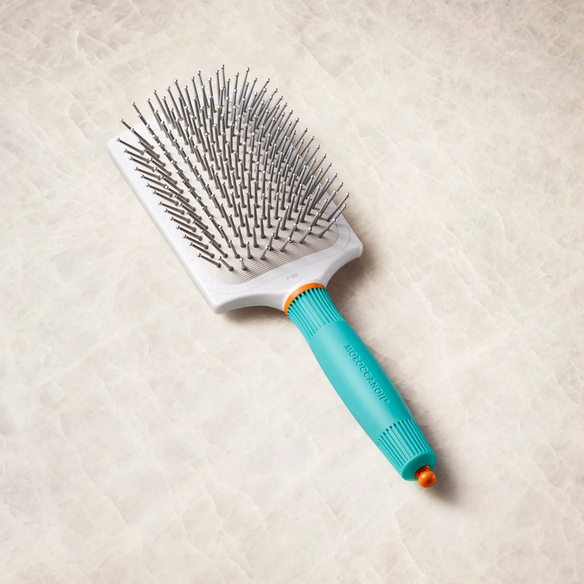 Moroccanoil Paddle Brush – taj salon and spa